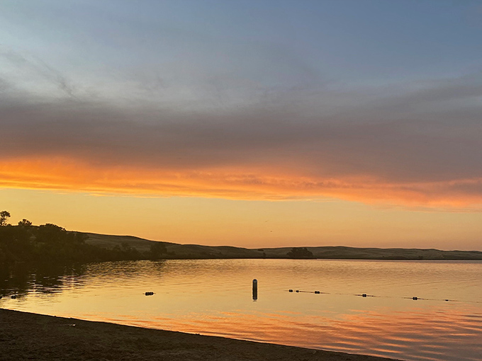 Nature's own light show at sunset turns Beaver Lake into a mirror of liquid gold. No filter needed or possible.
