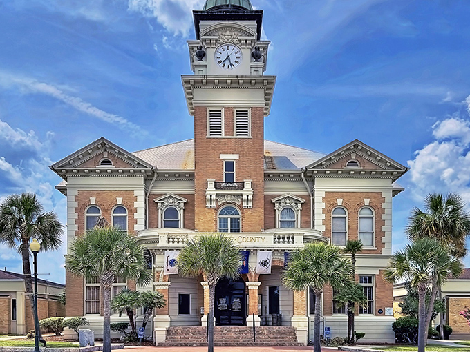 Not just a courthouse but a postcard come to life. Those palm trees aren't just decorative&mdash;they're nature's way of saying "You're definitely in Florida now."