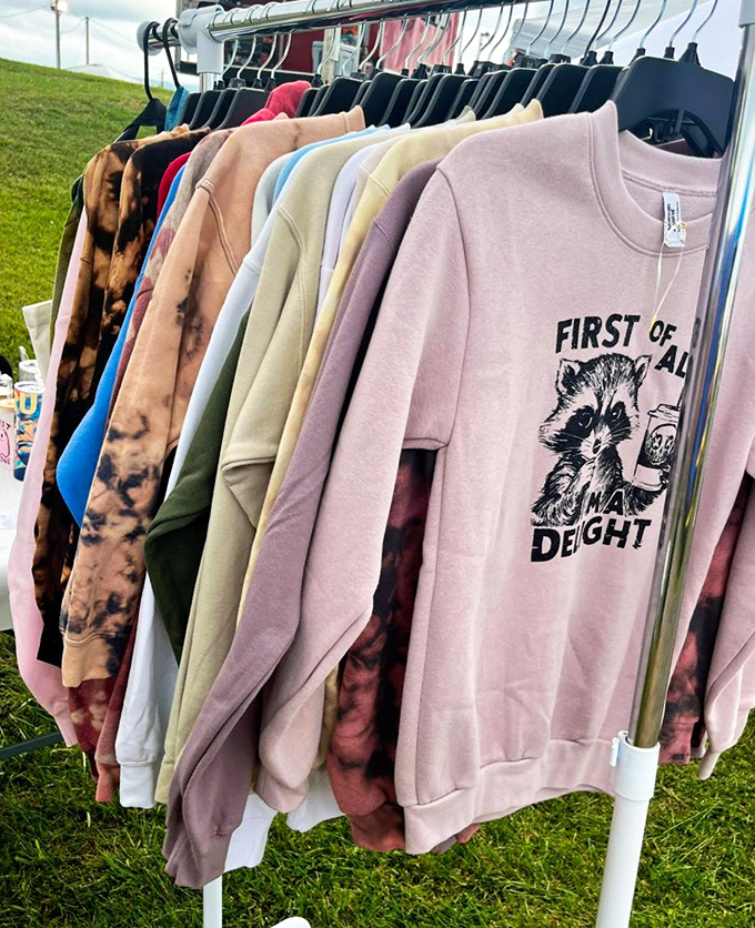 The raccoon sweatshirt says it all: "First of all, NAH." Perfect attire for when you need to politely decline yet another Zoom meeting invitation.