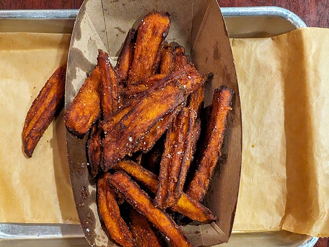 Sweet potato fries glazed to caramelized perfection, proving that vegetables can absolutely be dessert in disguise if you cook them right.
