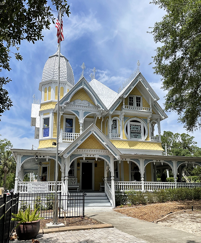The Donnelly House stands like a Victorian confection, its yellow and white gingerbread trim practically daring you not to smile at its whimsical grandeur.