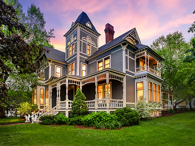 The Real Magic House: Victorian splendor at twilight&mdash;this architectural masterpiece glows with the kind of craftsmanship that makes modern homeowners weep with envy.
