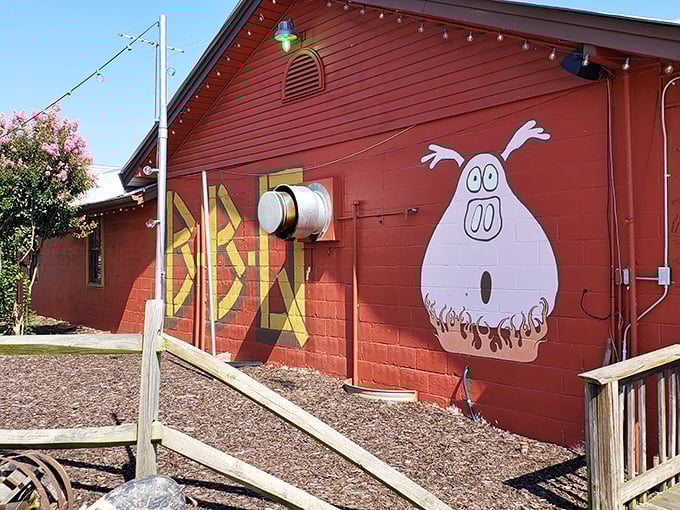 The Smokin' Pig's whimsical mural tells you everything you need to know—this place takes BBQ seriously enough to joke about it.