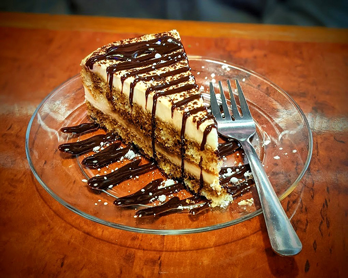 Layers of coffee-soaked ladyfingers and mascarpone create the architectural marvel known as tiramisu. A dessert worth saving room for.