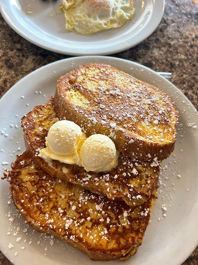 French toast so perfectly golden and butter-topped, it makes you wonder if breakfast was actually invented just for this moment.