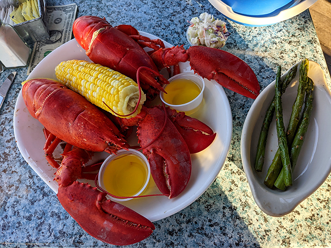 Twin lobsters with corn and drawn butter&mdash;nature's perfect threesome. The ocean's finest treasure, served with simple respect.