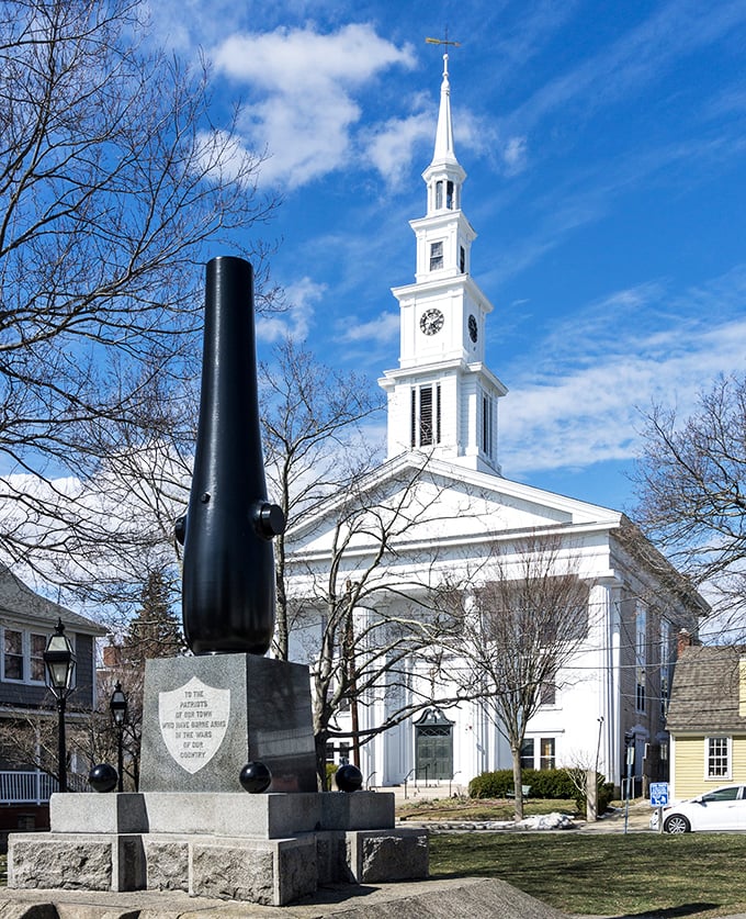 This classic white New England church steeple stands like a celestial GPS pin, reminding you that heavenly architecture doesn't require a European passport.