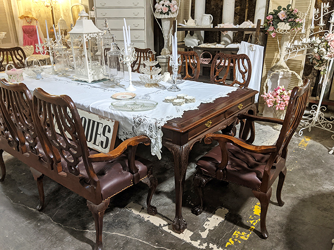 That formal dining ensemble waits patiently for someone who still believes Sunday dinner deserves proper china and matching chairs.