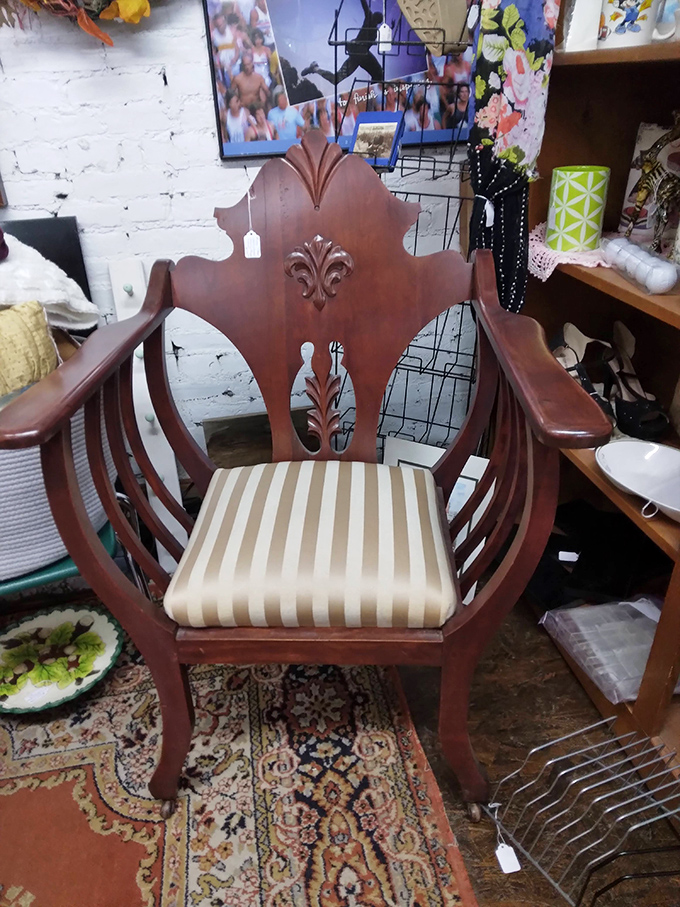 This ornate wooden throne wasn't made for Netflix binging. It's the kind of chair that demands proper posture and perhaps a monocle.