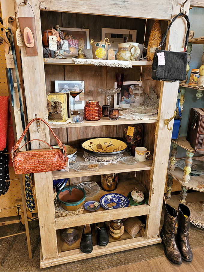 This rustic display could furnish an entire episode of Antiques Roadshow, with vintage handbags hanging like ripe fruit ready for picking.