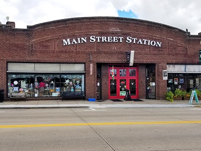 Main Street Station anchors downtown with its curved brick fa&ccedil;ade and cherry-red doors&mdash;a community hub disguised as a historic building.