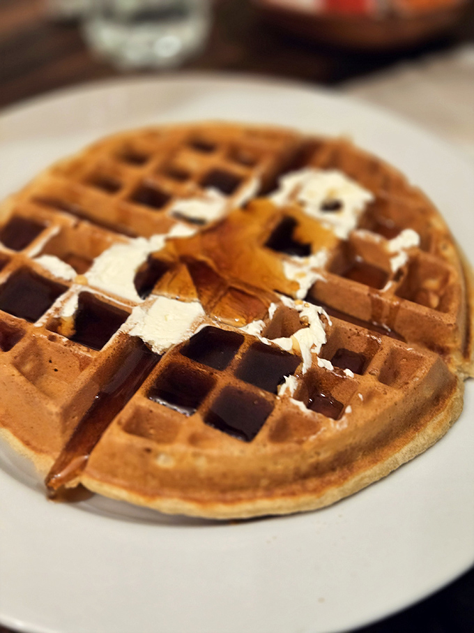 A waffle so perfectly golden, it could star in its own breakfast commercial.
