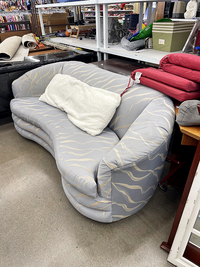 This wave-shaped gray couch isn't just furniture&mdash;it's a statement piece saying "I'm sophisticated, but I also know how to score an amazing deal."