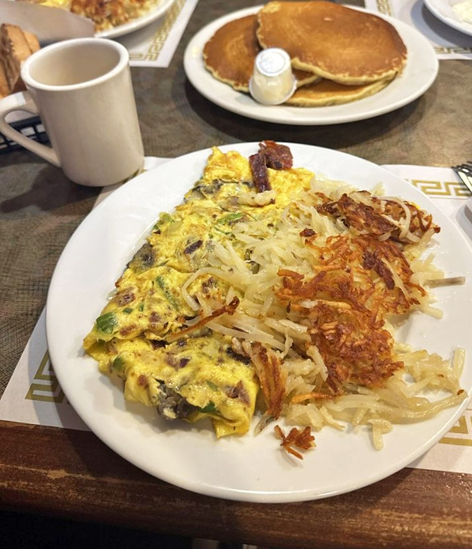 A Western omelet that would make John Wayne tip his hat, paired with hash browns crisped to golden perfection.