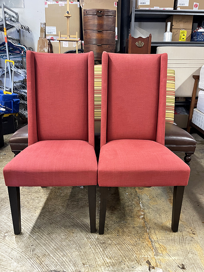 These coral wingback chairs aren't just seating&mdash;they're statement pieces that would cost a fortune new but here await for the price of a fancy coffee.