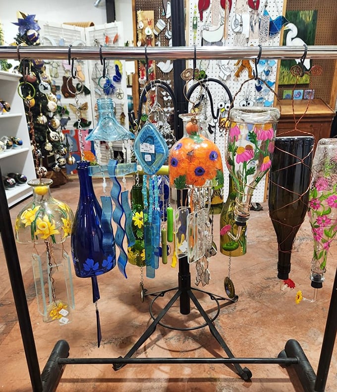 These aren't just repurposed bottles &ndash; they're wind chimes transformed into hanging gardens of glass, where sunlight creates dancing prisms.
