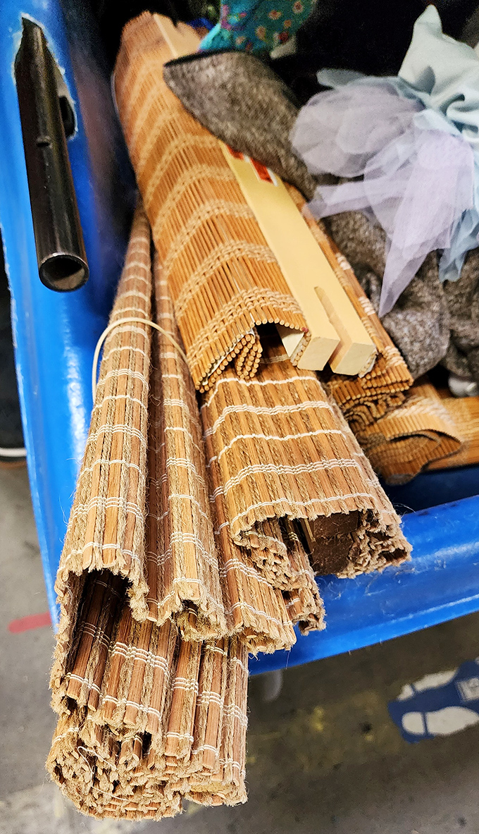 Bamboo blinds rolled up like treasure maps. Perfect for the DIY decorator who knows that window treatments shouldn't cost more than the windows themselves.