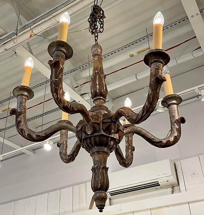 This wooden chandelier doesn't just light a room&mdash;it transforms it. Like having a piece of medieval castle hanging from your ceiling. 