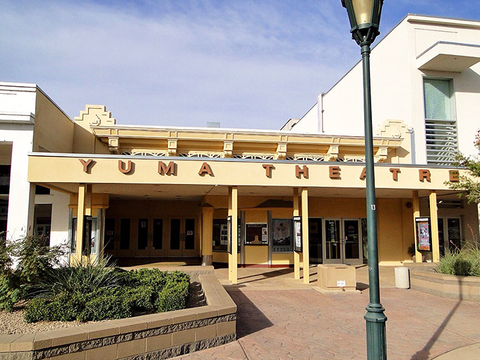 The Historic Yuma Theatre marquee promises entertainment without big-city prices. Broadway production values with small-town ticket costs!
