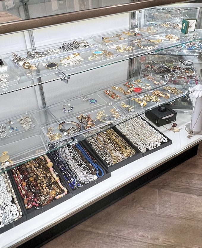 Behind glass cases, costume jewelry and vintage accessories await their second act. One person's "too much" is another's "just enough."