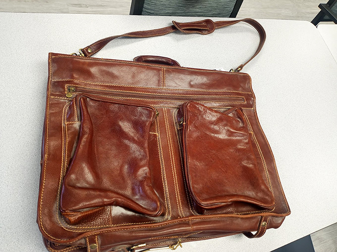 This well-loved leather messenger bag has stories to tell. For under fifty bucks, those stories can become chapters in your own life.