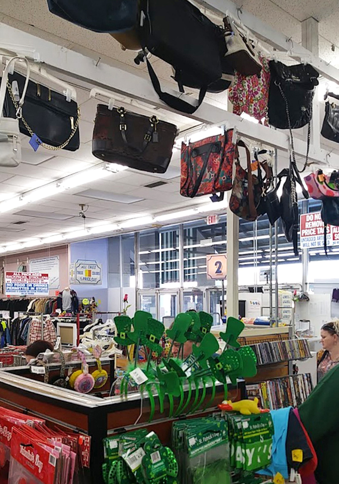 Handbags hang like trophies from the ceiling, each one a potential Mary Poppins bag of endless possibilities.