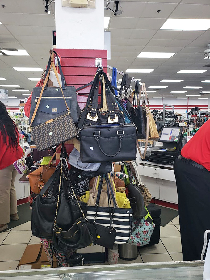 Handbag heaven! Designer lookalikes and genuine finds dangle like fashionable fruit, ripe for the picking by savvy shoppers.