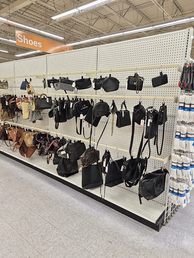 Handbag paradise where leather treasures hang in suspended animation. Your next conversation piece is waiting patiently on these pegboards.