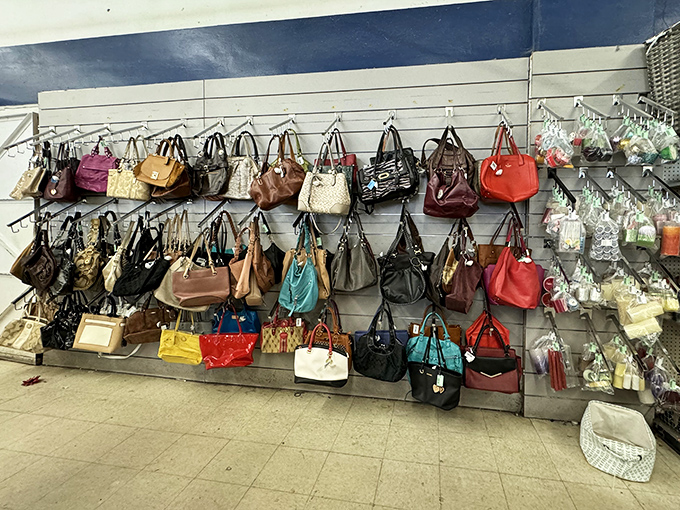 Handbag heaven! A rainbow of purses dangles like fashionable fruit, proving one shopper's castoff is another's designer steal.