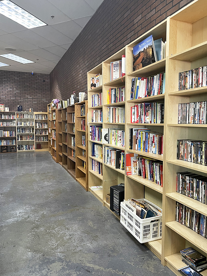 Bookworms rejoice! These wooden shelves hold literary adventures from bestsellers to obscure gems. Someone's abandoned beach read could be your new favorite novel.