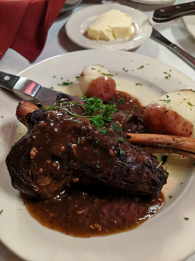 The balsamic braised lamb shank doesn't just fall off the bone&mdash;it practically leaps onto your fork, trailing its rich, glossy sauce.