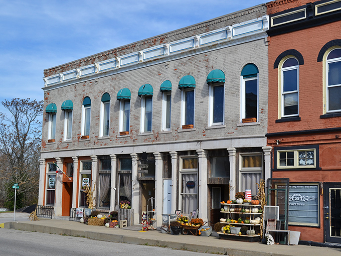 These teal awnings add a touch of whimsy to historic architecture, like bow ties on a distinguished gentleman who still knows how to party.