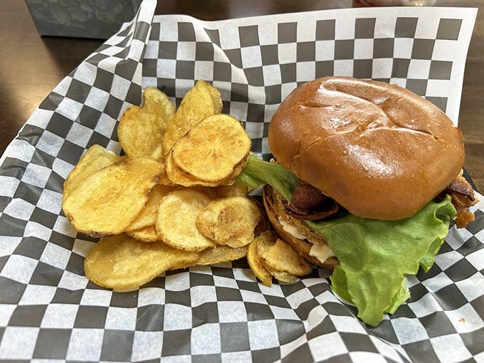 This burger doesn't need fancy aioli or artisanal buns to win your heart. The house-made chips are the unsung heroes of this plate.
