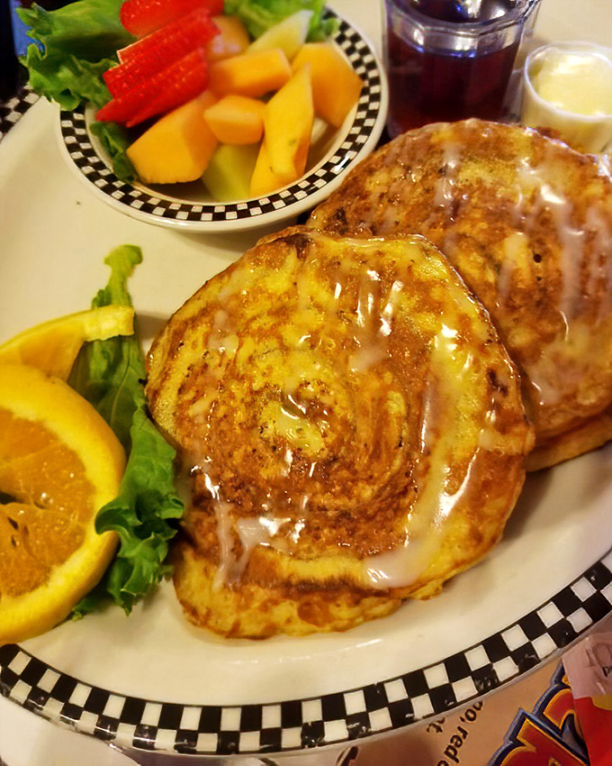 French toast that makes you wonder if breakfast should actually be classified as dessert. The maple syrup river adds the perfect sweet finale.