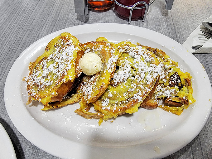 French toast that makes you question every other breakfast you've ever had. Those golden slices look like they were dipped in sunshine before hitting the griddle.