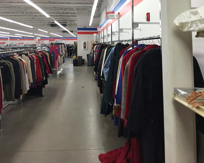 The clothing section stretches into infinity—a textile time machine where fashion from every decade awaits rediscovery.