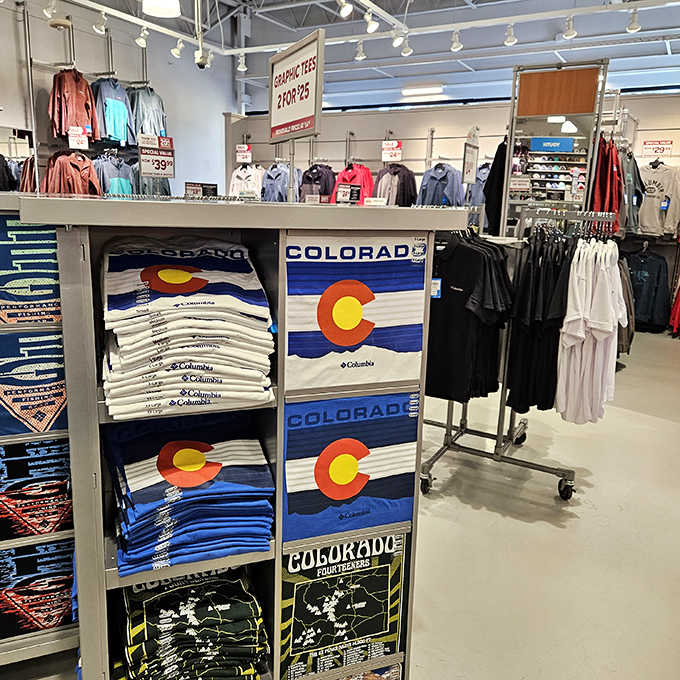 Colorado pride on full display &ndash; because nothing says "I conquered shopping at altitude" like a t-shirt with the state flag.