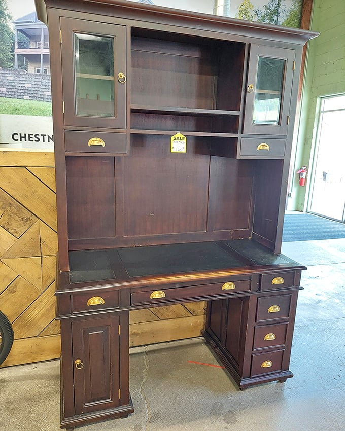 This handsome desk with hutch isn't just furniture; it's a statement piece with enough drawers to hide evidence of your organizational shortcomings.