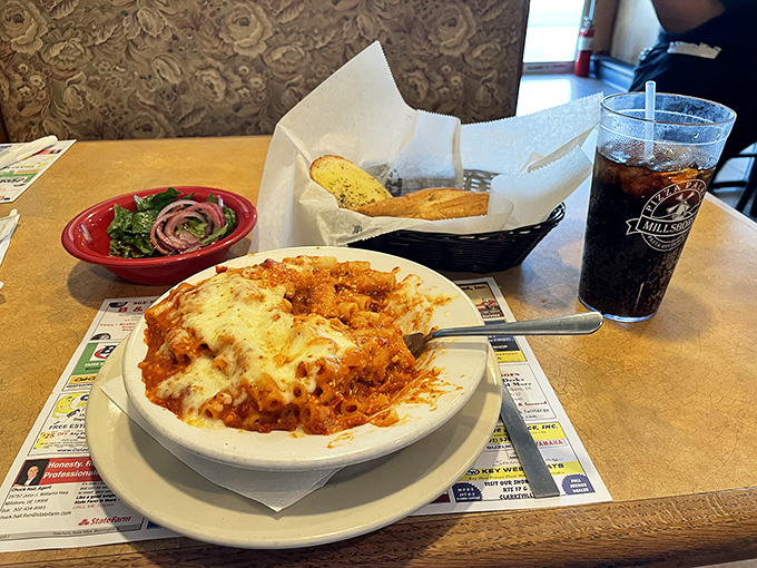 Baked ziti that's seen more cheese than a Wisconsin dairy farm. The kind of comfort food that makes you want to hug the chef.