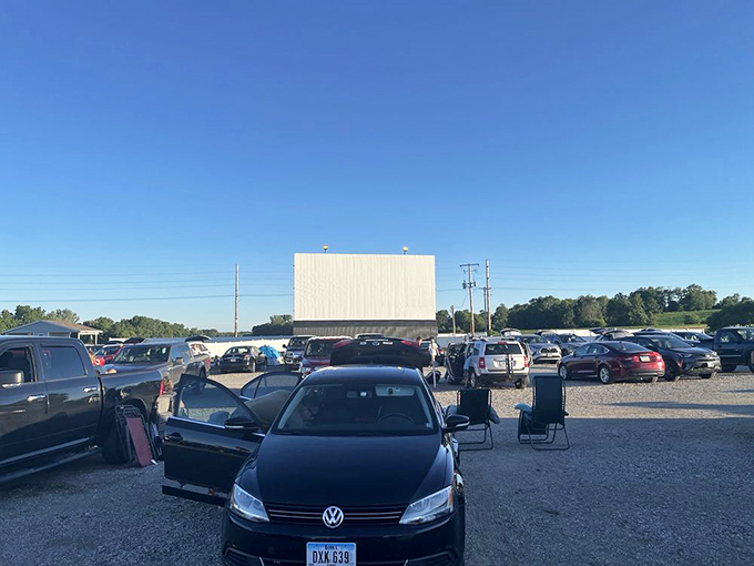 Car doors flung open, chairs unfolded, the audience settles in as the sun begins its descent. The best seat in the house is wherever you park.