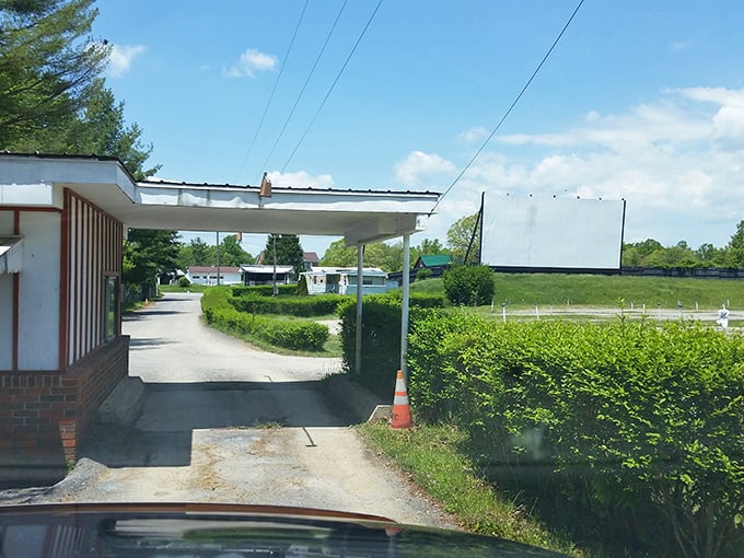 The entrance beckons you into a world where cars replace theater seats and the sky becomes your ceiling.