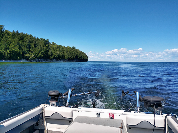 Your first glimpse of Rock Island often comes from the water, a green oasis rising from Lake Michigan's blue expanse.