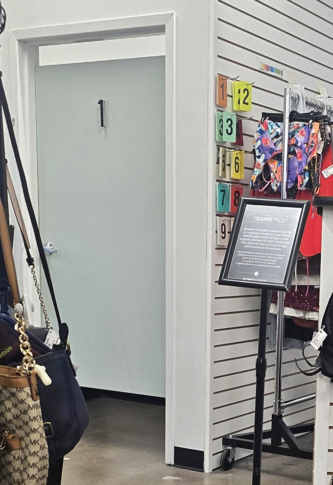 Fitting room #1 stands ready for your fashion auditions. No dim lighting or funhouse mirrors here—just honest reflections and multiple hooks.