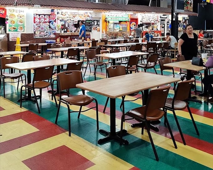 Empty tables mean it's not peak dining hour yet—a rookie mistake. The real swap meet pros know exactly when to arrive for maximum taco enjoyment.