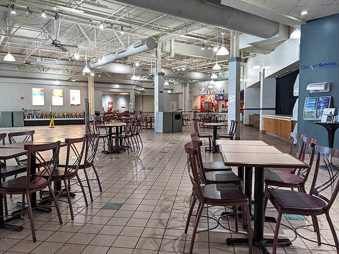 The food court: where shopping warriors refuel before the second wave of bargain battles. Those chairs have witnessed many "should I buy it?" debates.