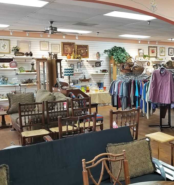 Furniture vignettes create little islands of possibility&mdash;that wooden rocker and vintage sofa practically whispering, "We'd look perfect in your living room."