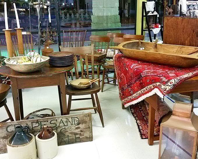 "Grapes and Coffee" the sign declares, while wooden dough bowls and sturdy chairs whisper of farmhouse kitchens and Sunday suppers past.