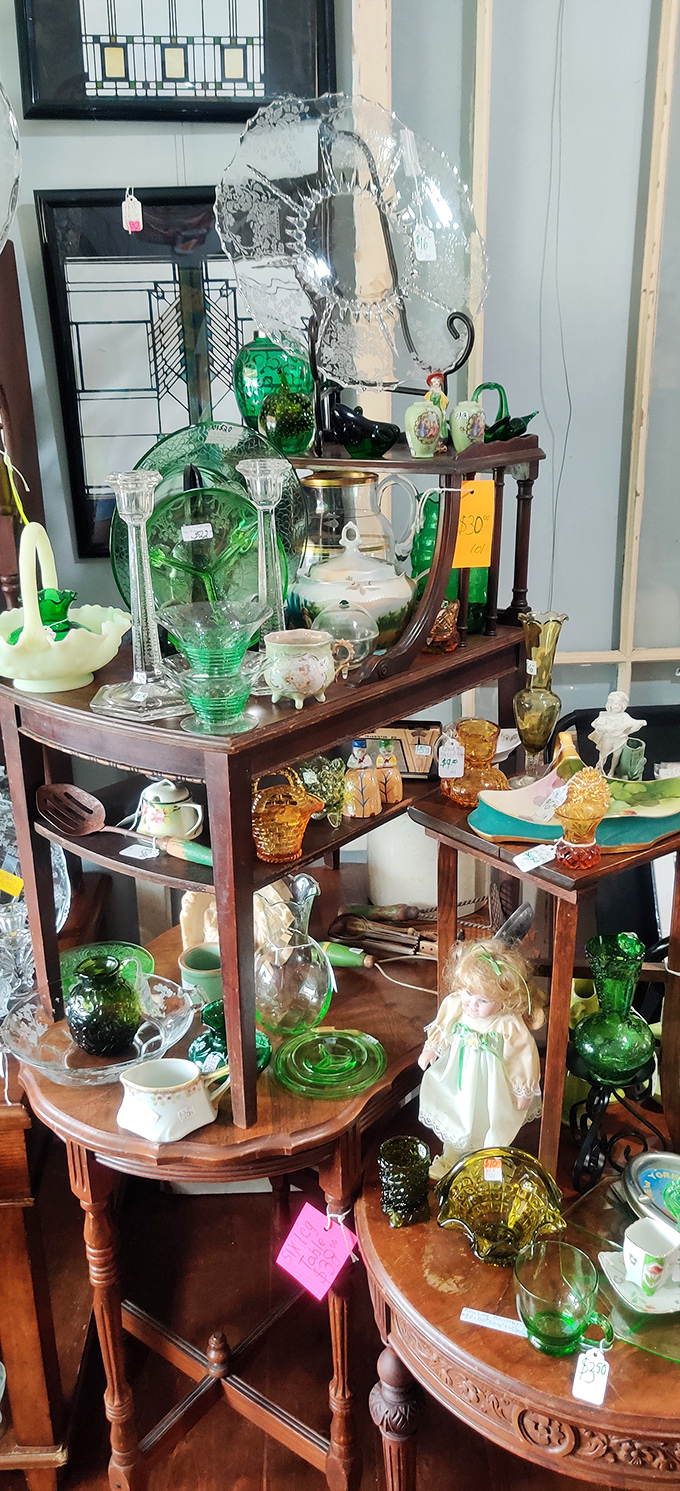 A symphony in green glass. This collection of emerald treasures and delicate porcelain proves that one person's castoffs become another's centerpiece.