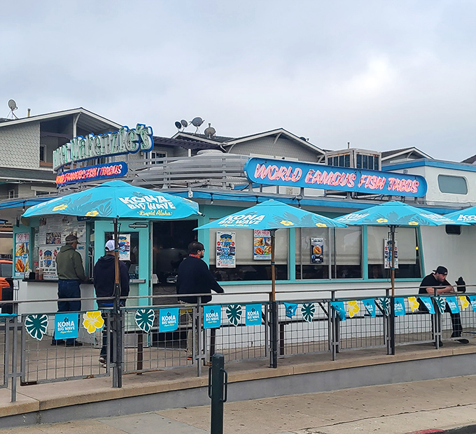 Even on cloudy days, loyal customers line up outside this coastal gem. Good food creates its own sunshine.