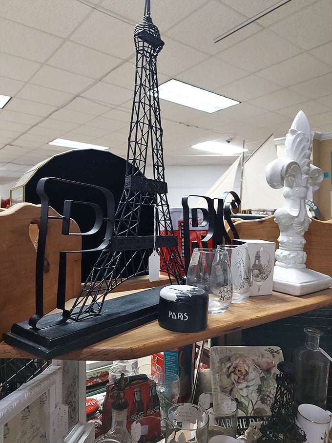 Paris meets farmhouse chic in this eclectic display, where the Eiffel Tower stands proudly among treasures from across the Atlantic.